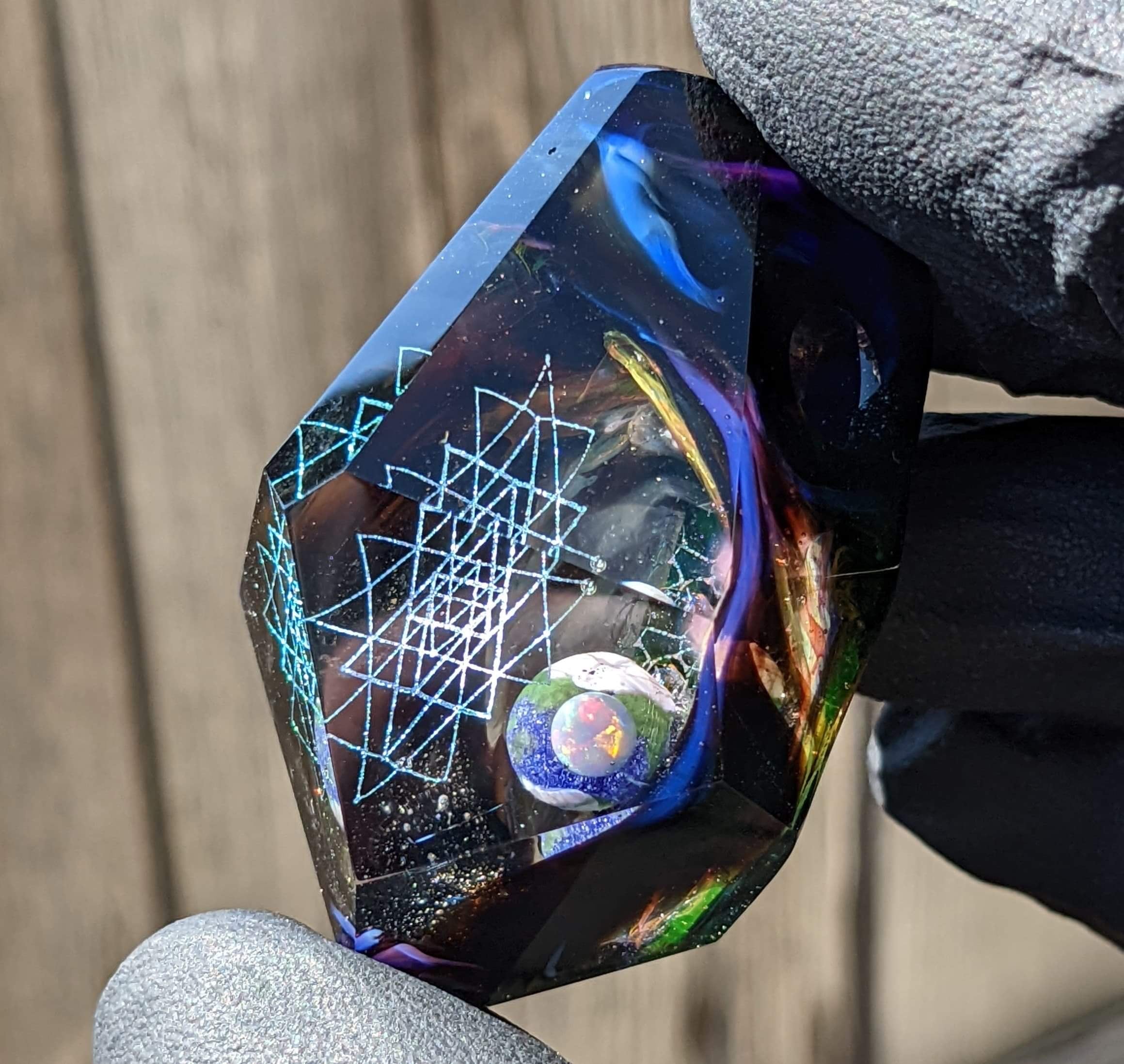 Faceted earthly planet pendant with geometrical patterns and opal moon – jes durfee glass art